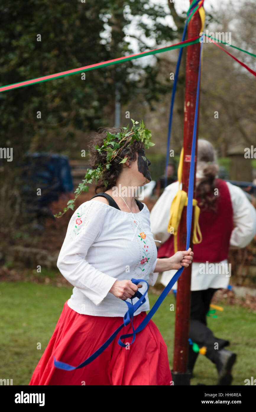A woman taking part in maypole dancing at the Marsden Cuckoo Festival ...