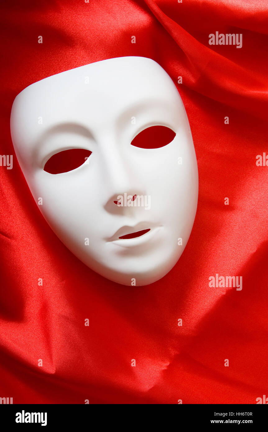 Theatre concept with the white plastic masks Stock Photo - Alamy
