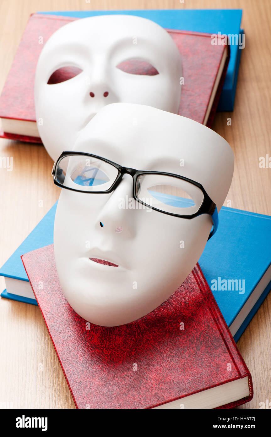 Reading concept with masks, books and glasses Stock Photo - Alamy