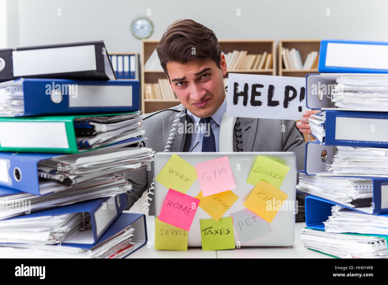 Busy businessman asking for help with work Stock Photo - Alamy