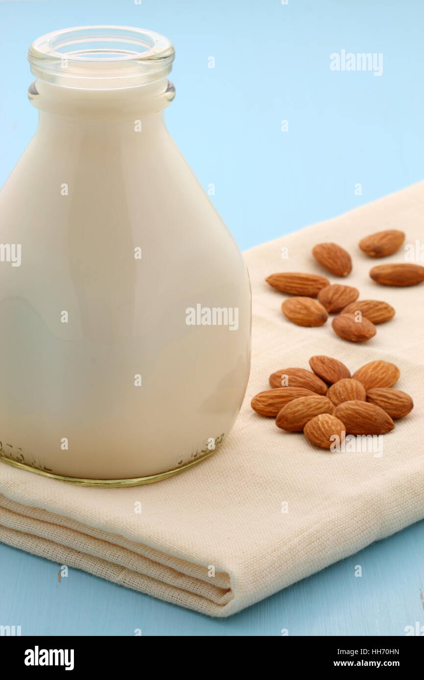 Delicious fresh almond milk, on vintage styling Stock Photo - Alamy