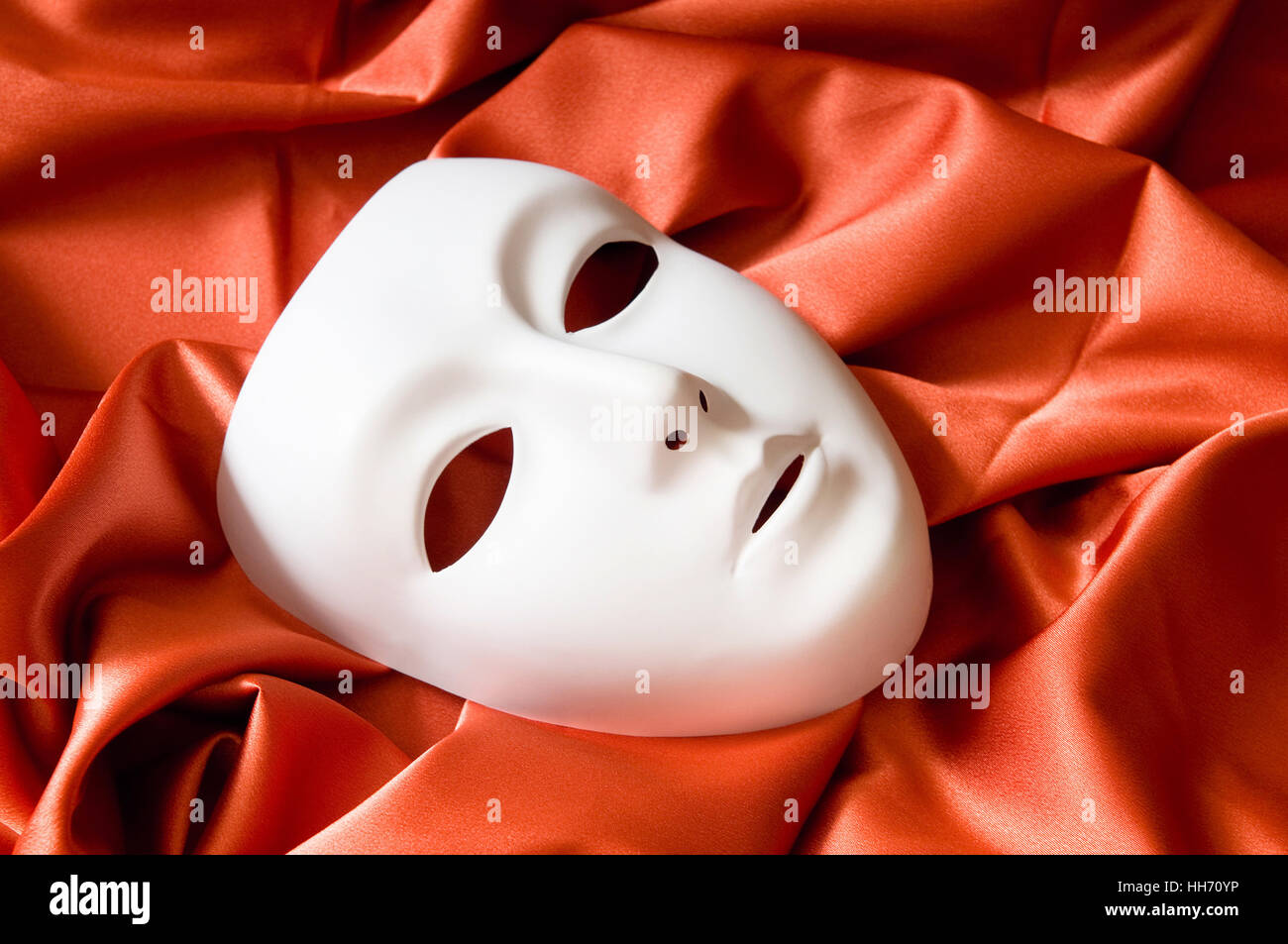 Theatre concept with the white plastic masks Stock Photo - Alamy