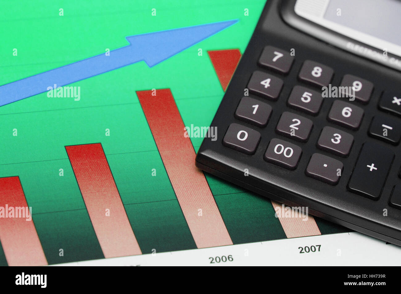 Close up of chart showing growth and calculator Stock Photo - Alamy