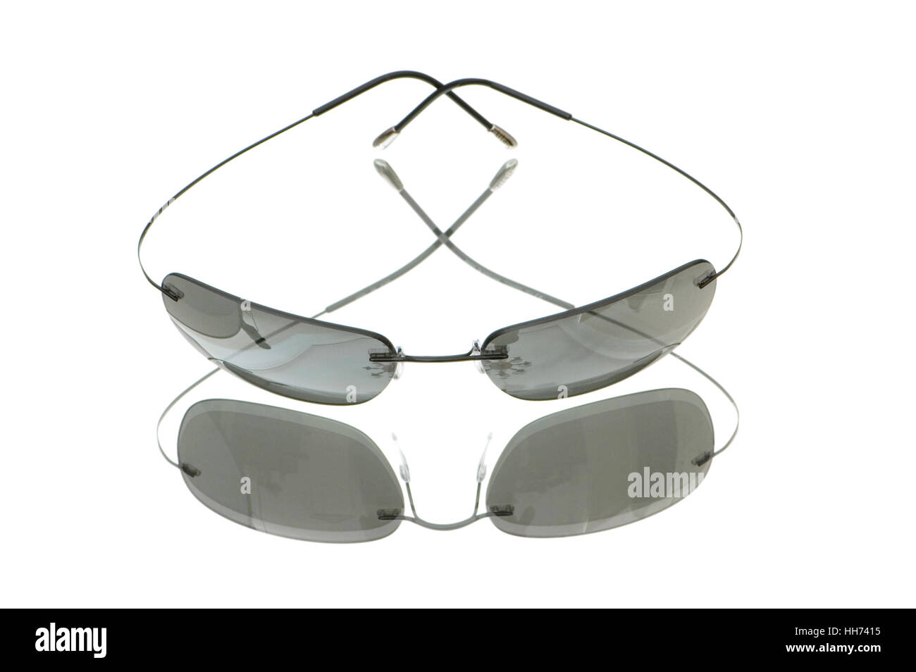 Stylish sun glasses on highly reflective background Stock Photo - Alamy