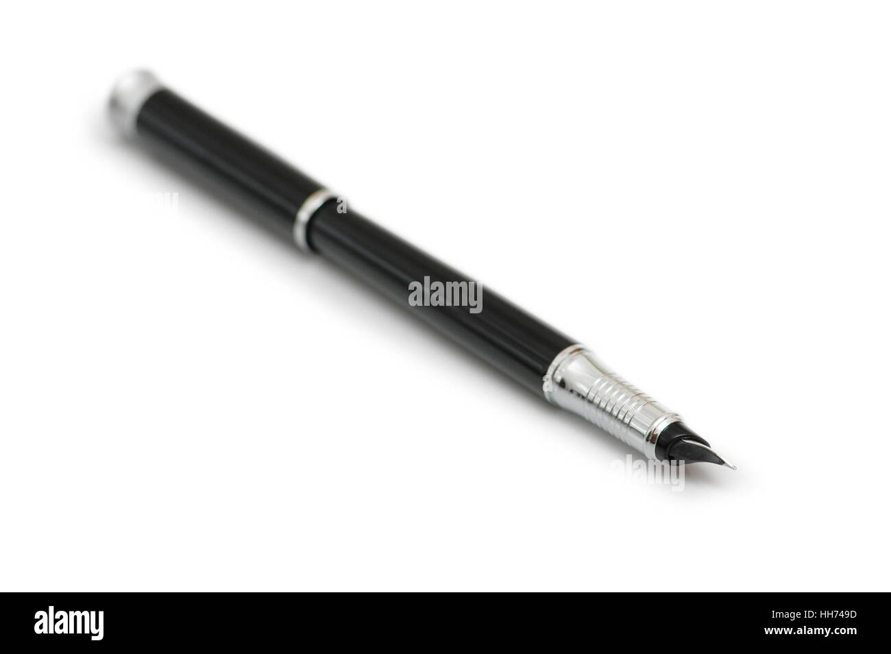 Silver pen isolated - focus on the tip Stock Photo - Alamy
