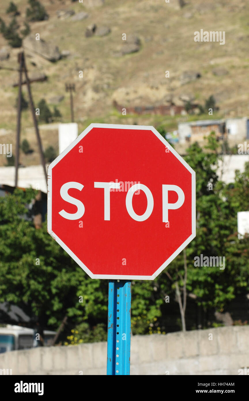 Red stop sign on a bright summer day Stock Photo - Alamy
