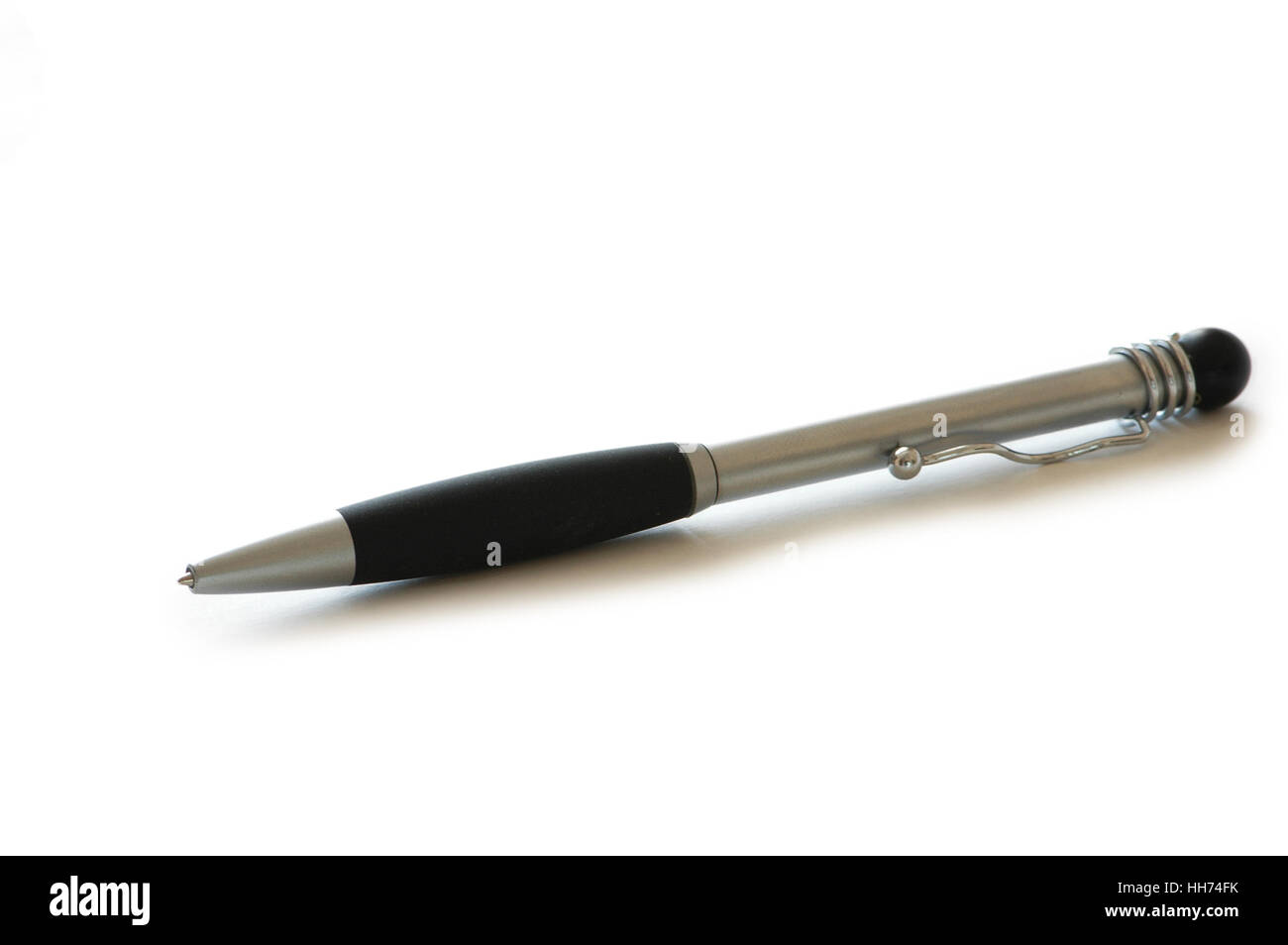 Silver pen isolated - focus on the tip Stock Photo - Alamy