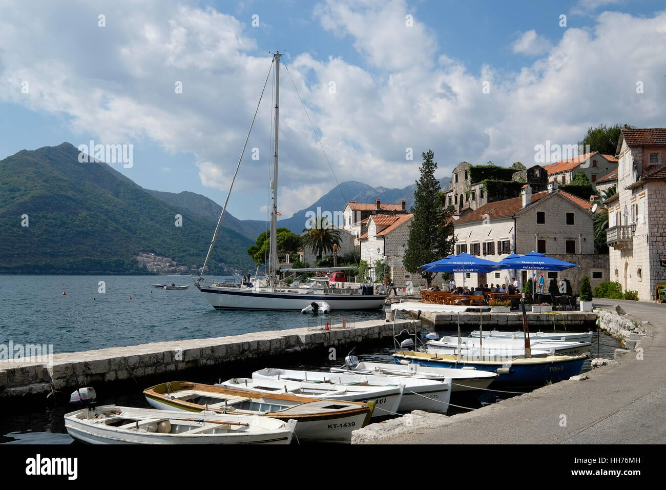 Boats lined up in the pretty town of Perast, Montenegro Stock Photo - Alamy