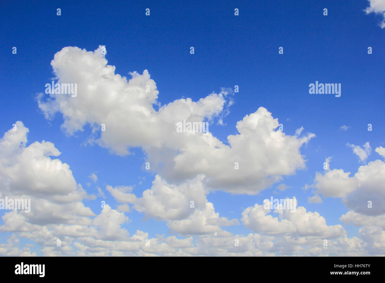 Blue sky with clouds background Stock Photo - Alamy