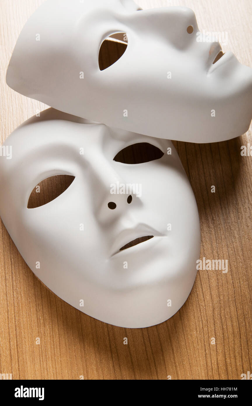 Theatre concept with the white plastic masks Stock Photo - Alamy
