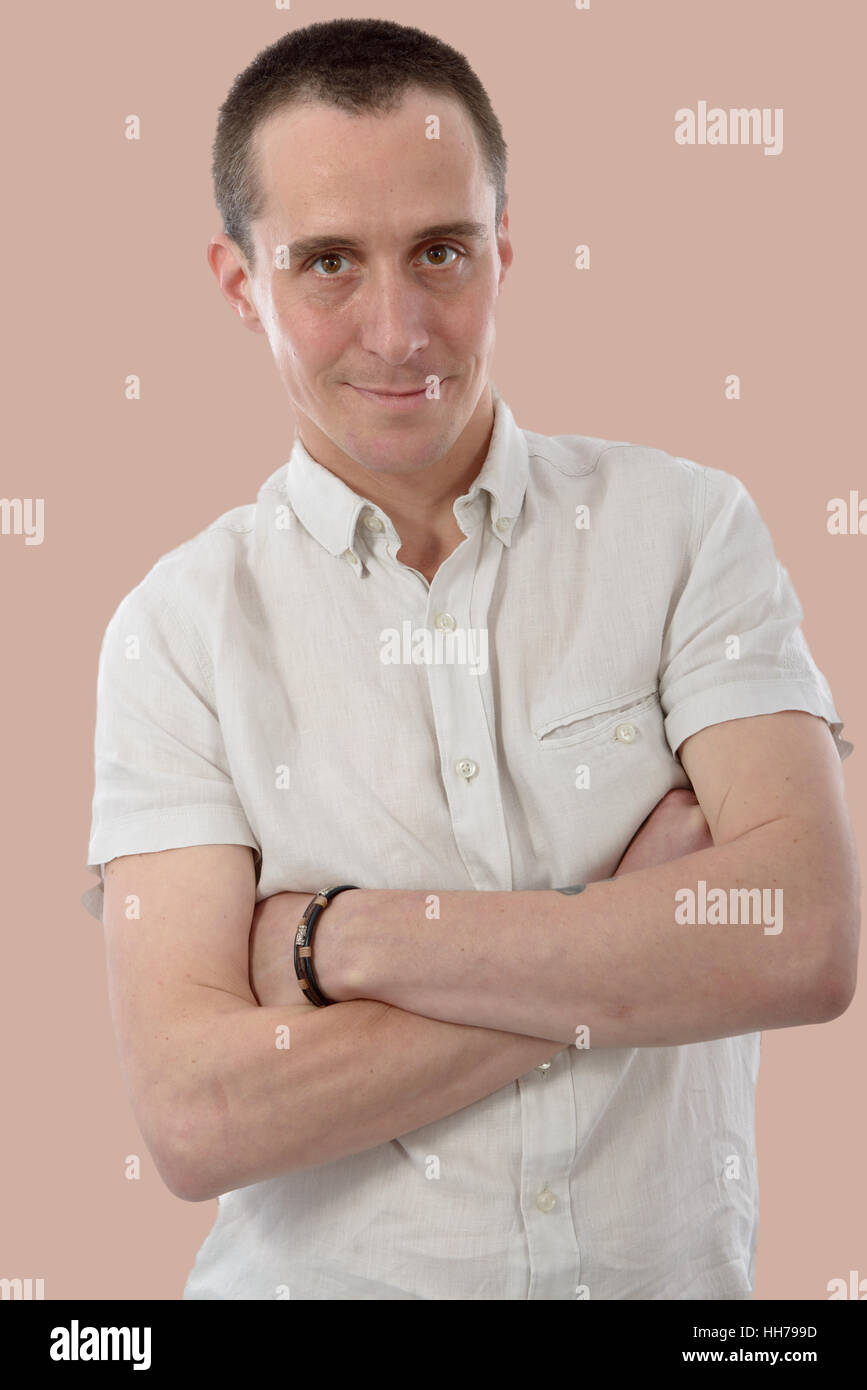 Portrait of a man with arms crossed Stock Photo - Alamy
