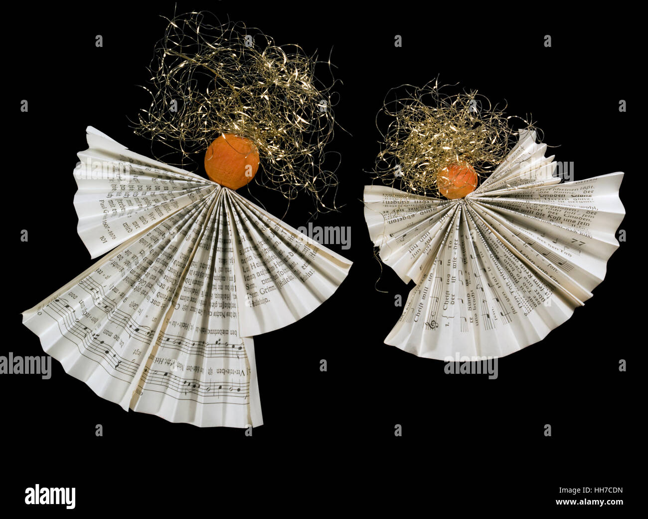 symbolic folded paper angels Stock Photo - Alamy