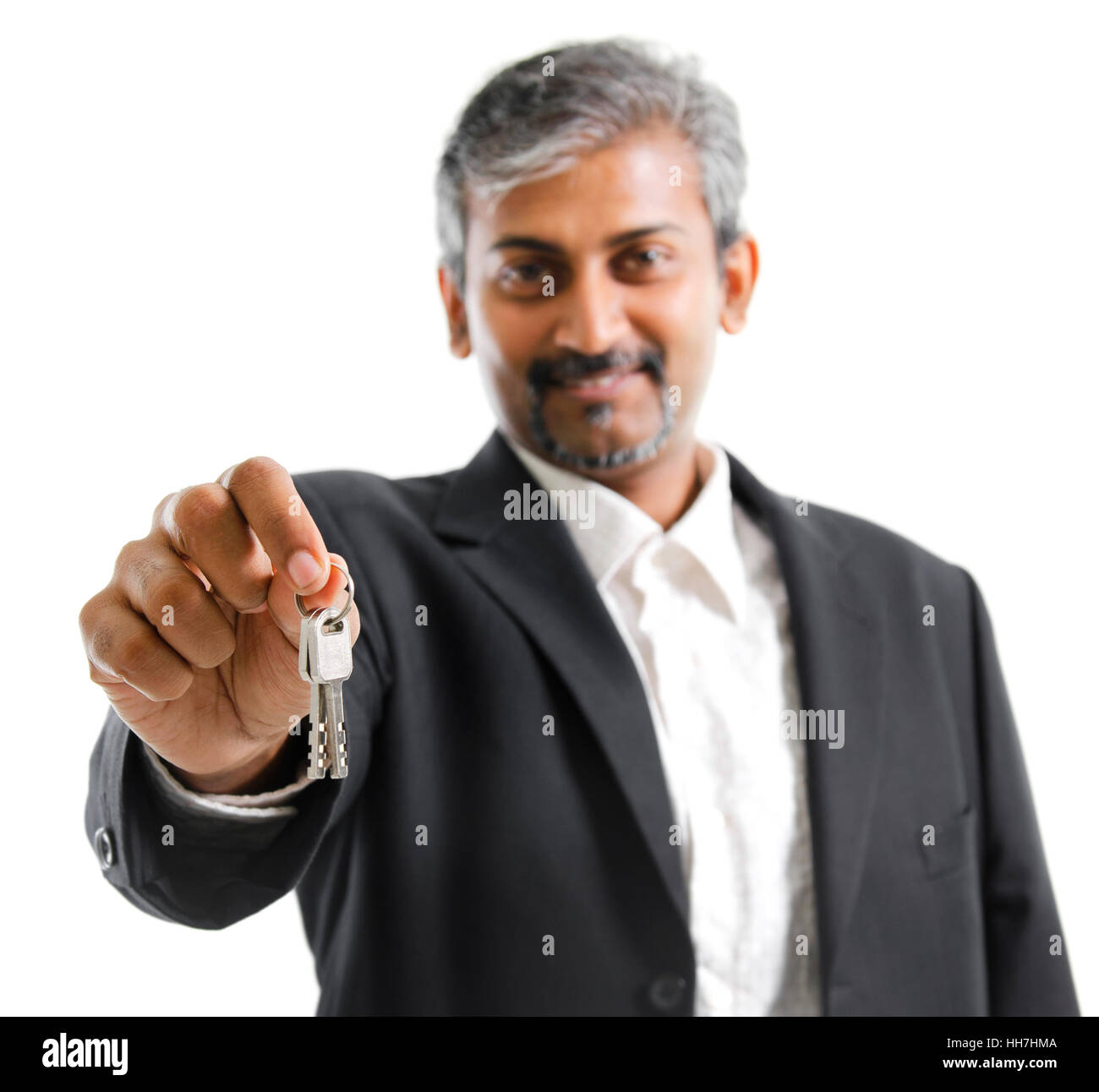 Indian business man house key hi-res stock photography and images - Alamy