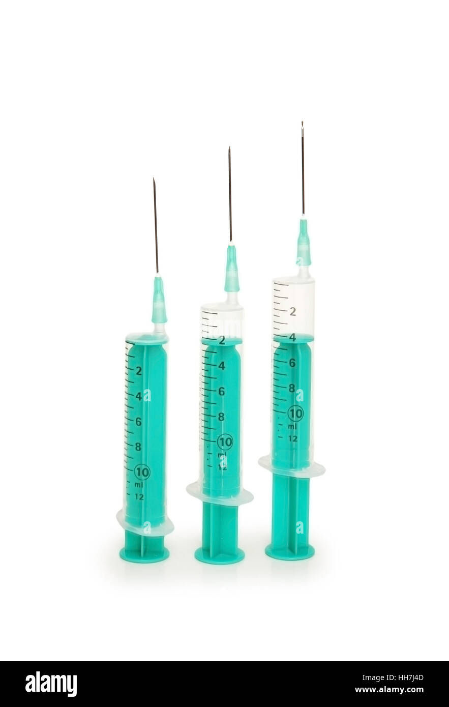 Three syringes isolated on white Stock Photo - Alamy