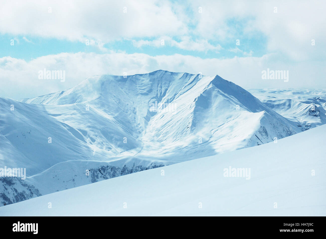 High mountains under snow in the winter Stock Photo - Alamy