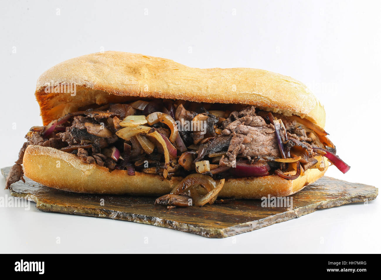 Tasty beef steak onion mushroom sandwich in a ciabatta Stock Photo - Alamy