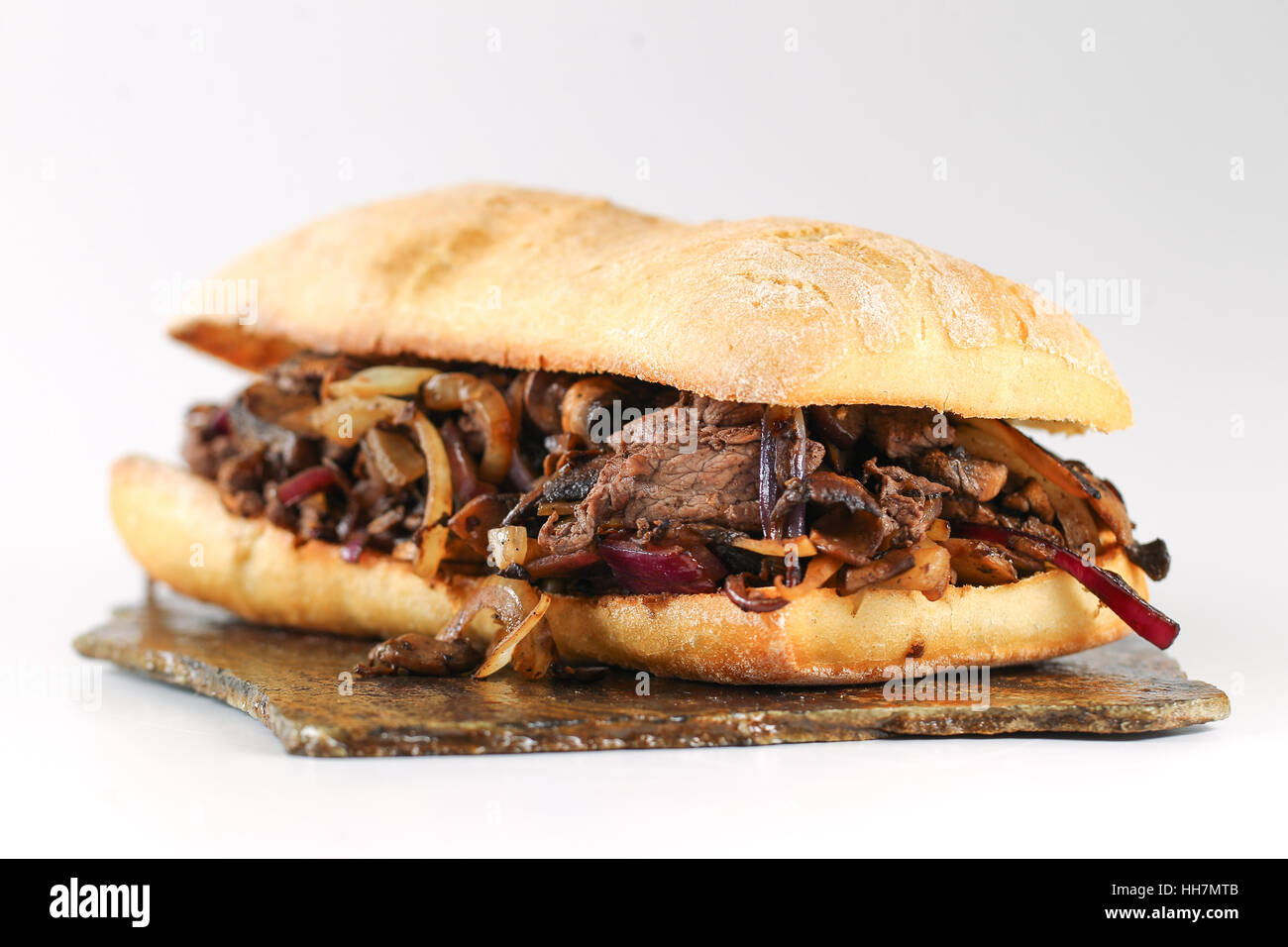 Tasty beef steak onion mushroom sandwich in a ciabatta Stock Photo - Alamy