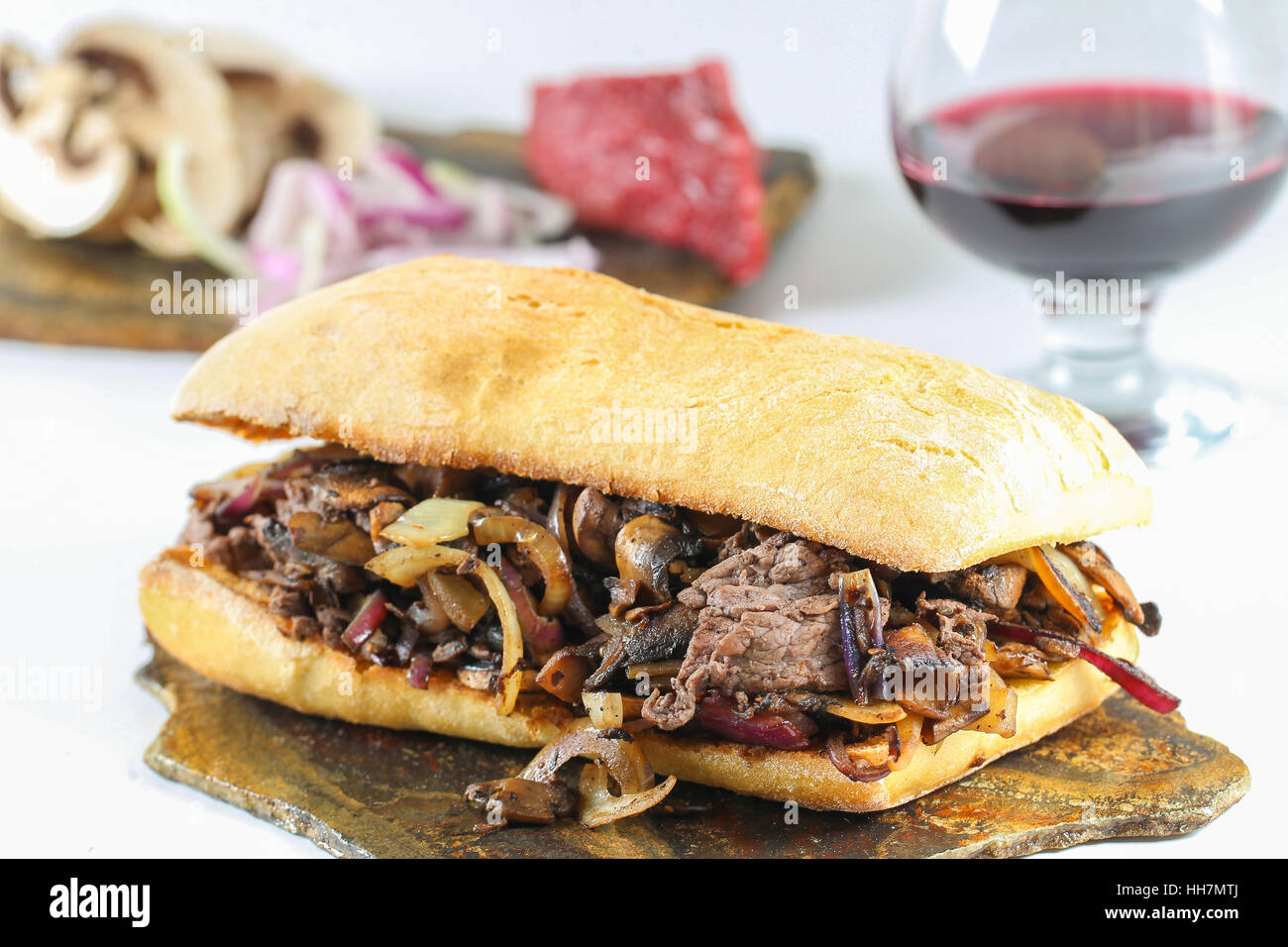 Tasty beef steak onion mushroom sandwich in a ciabatta Stock Photo - Alamy