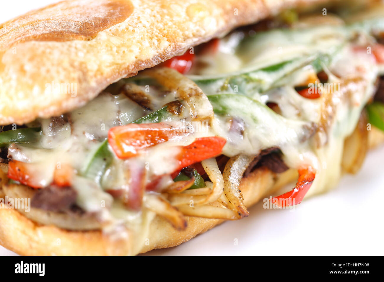 Tasty beef steak sandwich with onions, mushroom and melted provolone ...