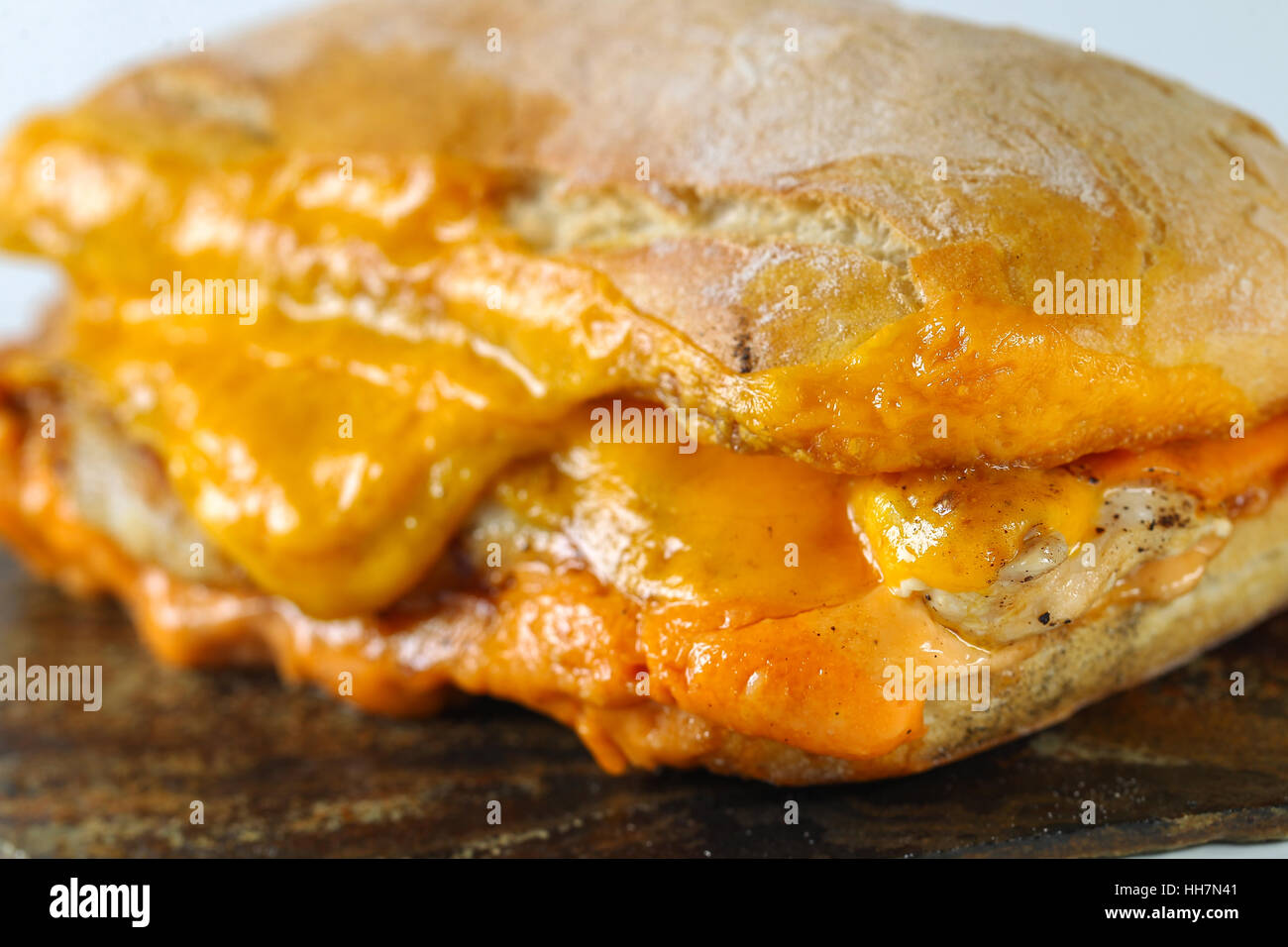 Tasty chicken steak sandwich in a ciabatta with cheddar cheese and ...