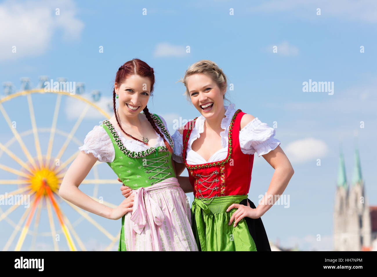 young women at the spring festival in a traditional dirndl Stock Photo ...