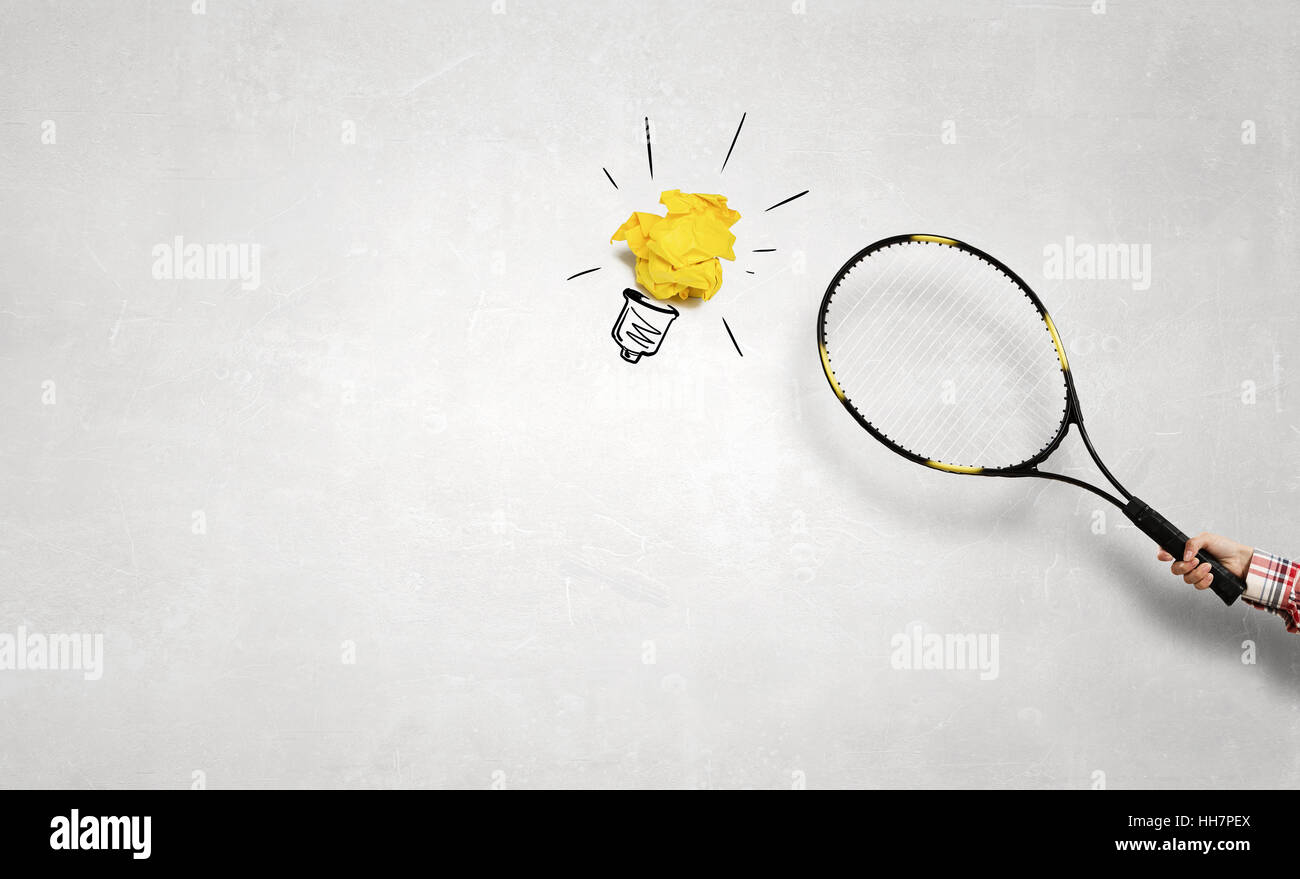 Close up on hand with big tennis racket Stock Photo - Alamy