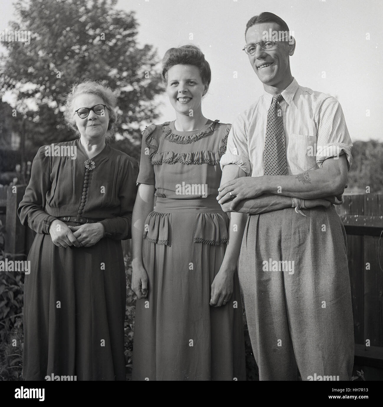1930s, historical, family picture outside of husband, wife and mother ...