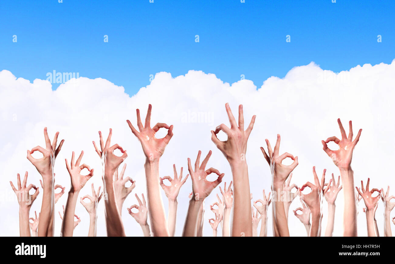 Row raised hands showing different hi-res stock photography and images ...