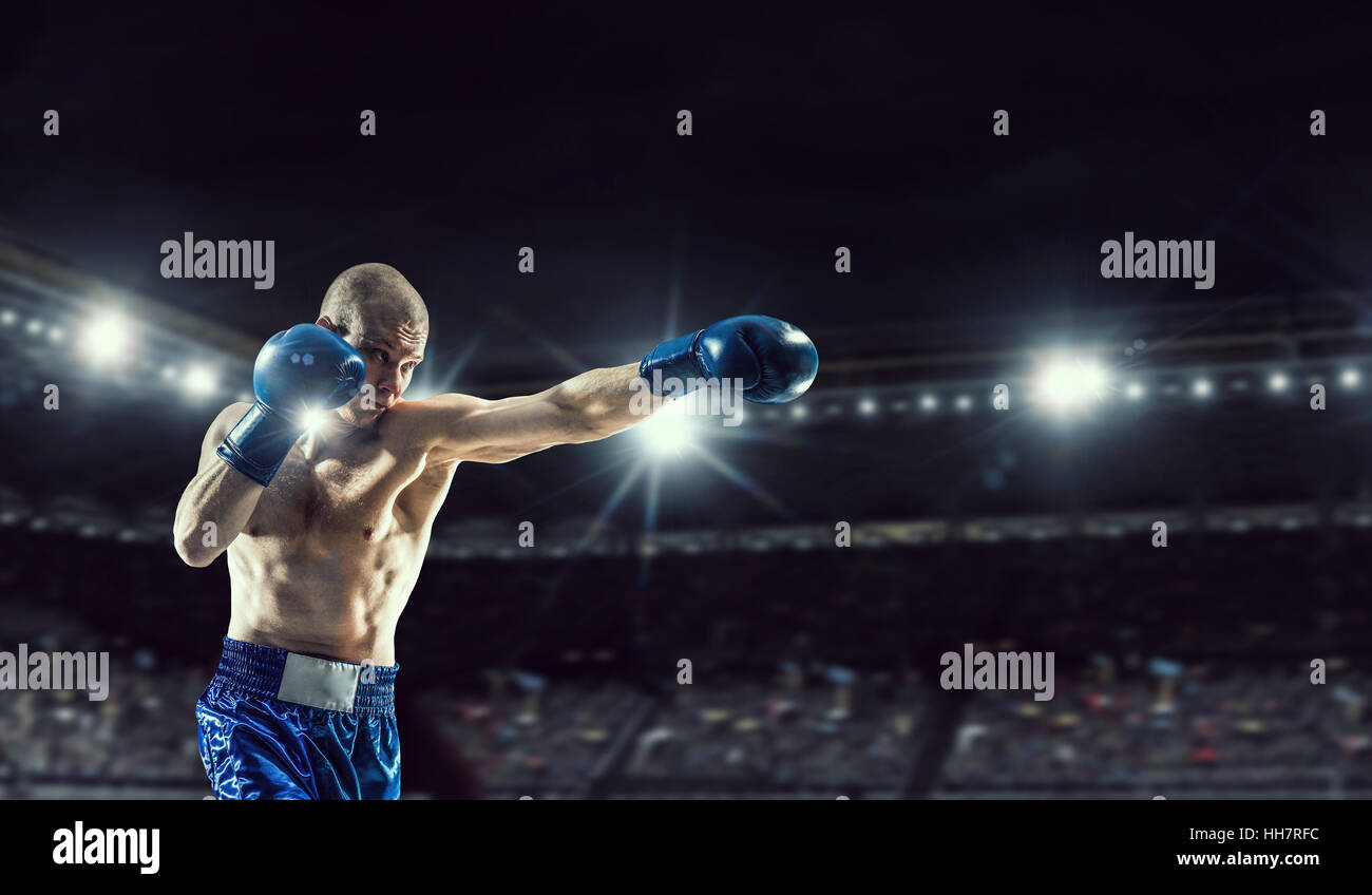 Professional box fighter on grand arena. Mixed media Stock Photo - Alamy