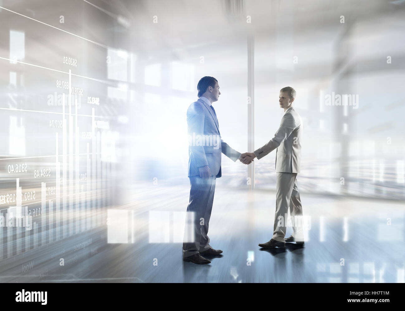 Two businessmen shaking hands to greet each other. Mixed media Stock ...