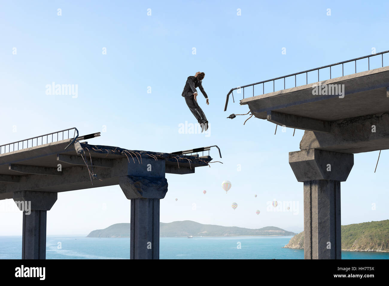 Businessman jumping over a gap in bridge as symbol of problem ...