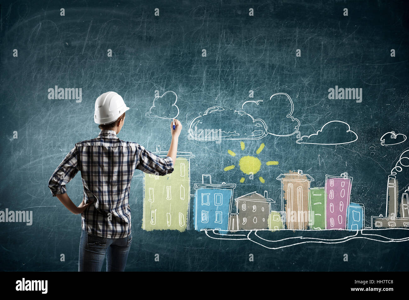 Rear view of engineer woman drawing construction plan Stock Photo - Alamy