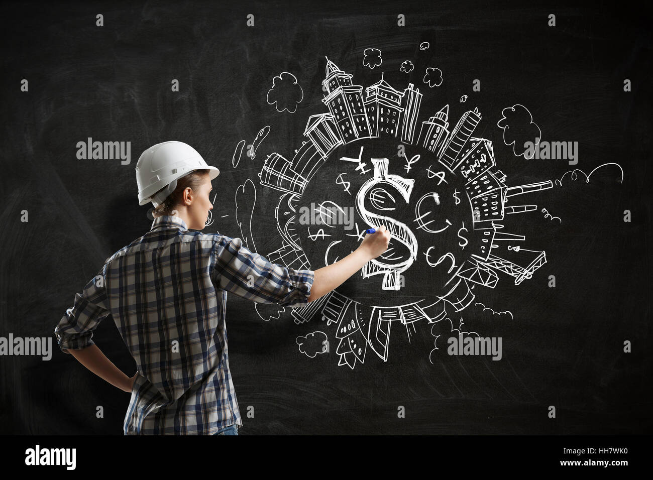 Rear view of engineer woman drawing construction plan Stock Photo - Alamy