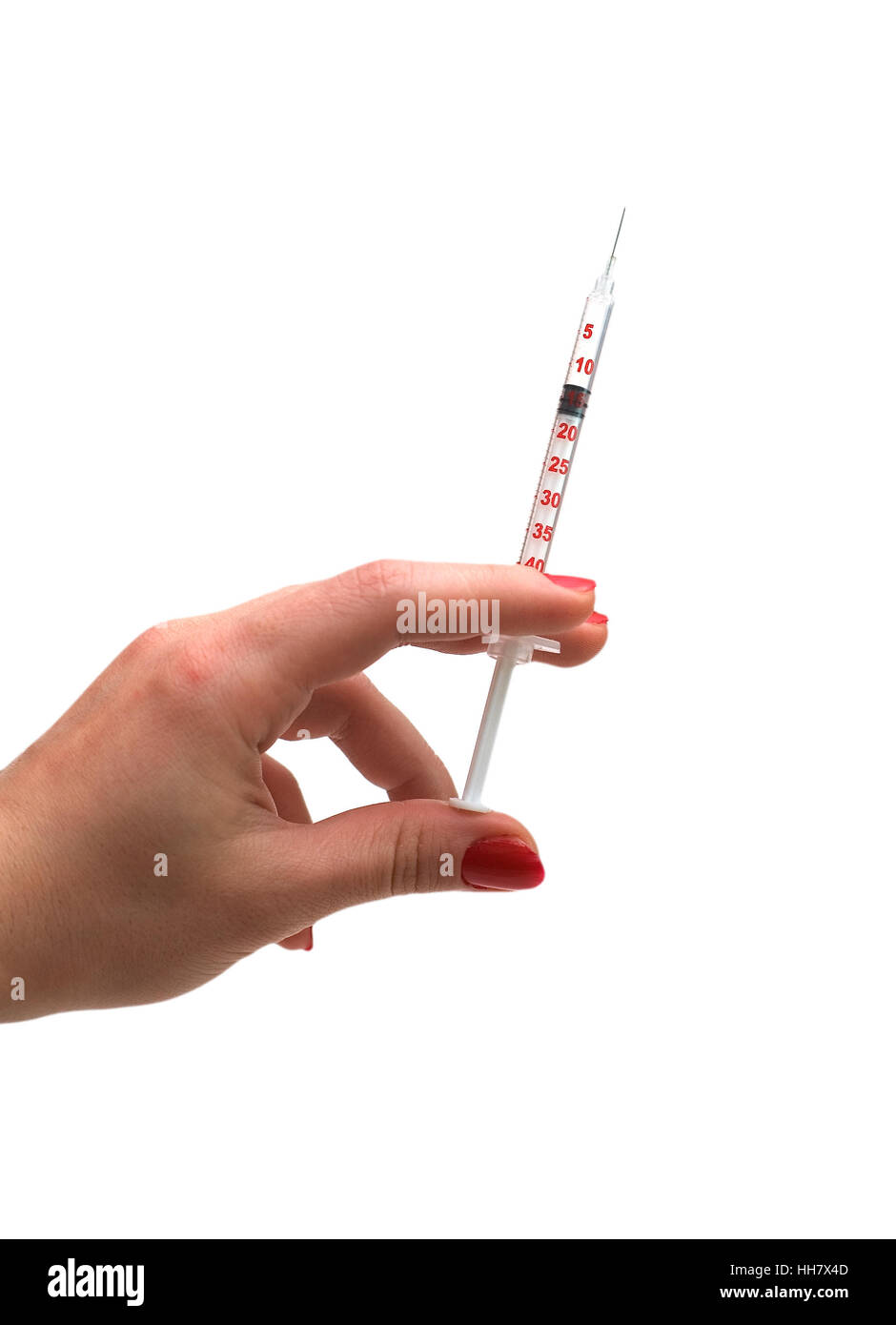 Hand holding syringe isolated on the white Stock Photo - Alamy