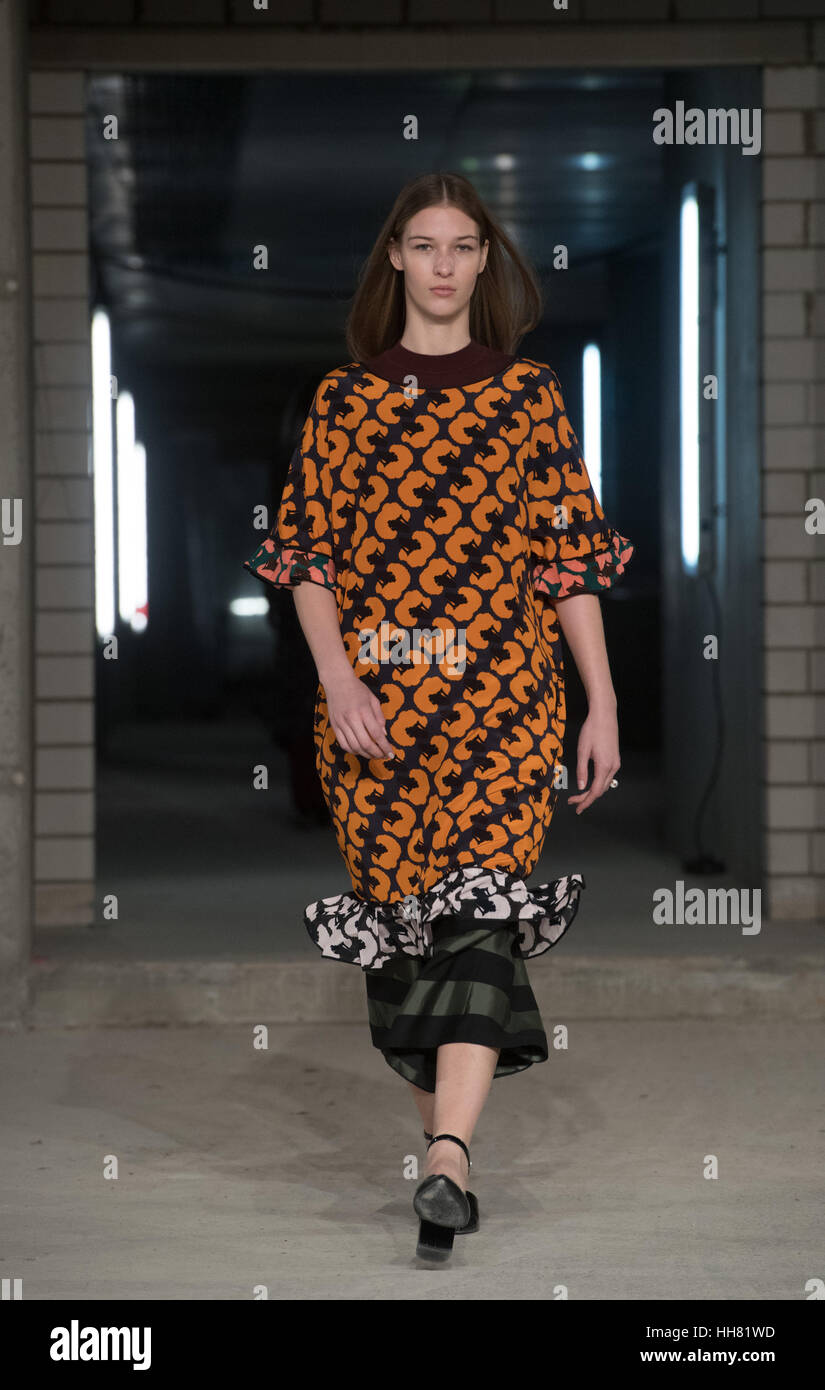 Berlin, Germany. 17th Jan, 2017. A model presents a creation from ...