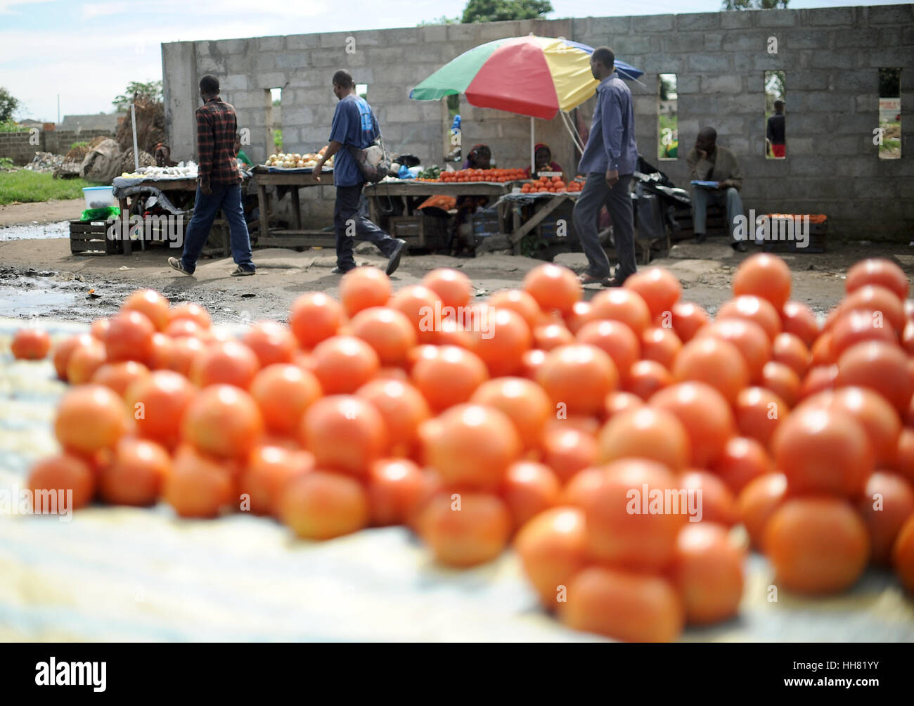 Lusaka, Zambia. 11th Mar, 2016. Tomatoes on offer inside the Chibolya ...
