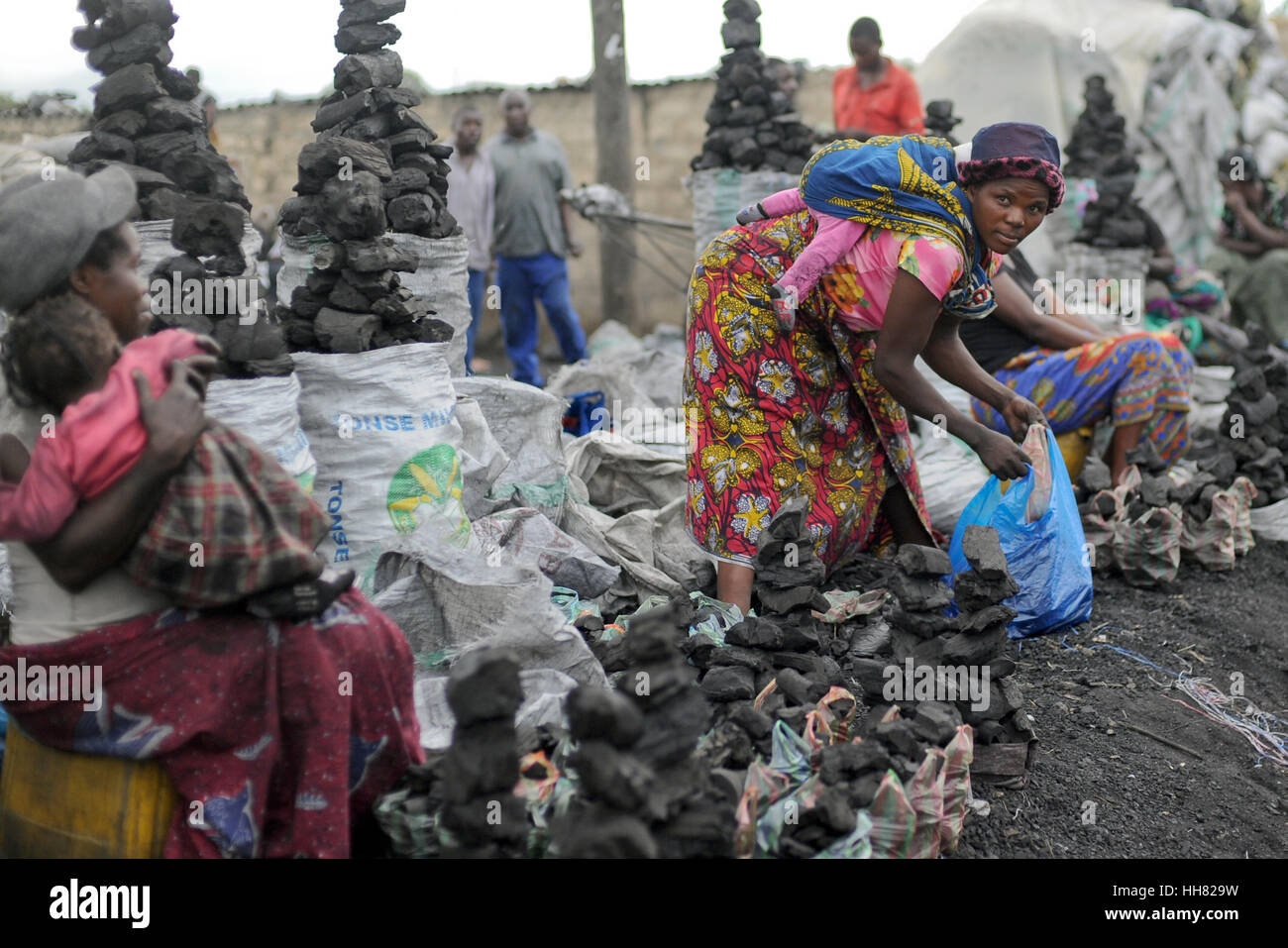 Lusaka, Zambia. 09th Mar, 2016. Women selling charcoal inside the ...
