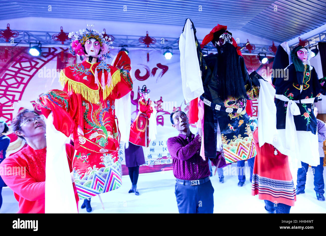 Zhangye, China. 17th Jan, 2017. Performers rehearse the puppet show in ...
