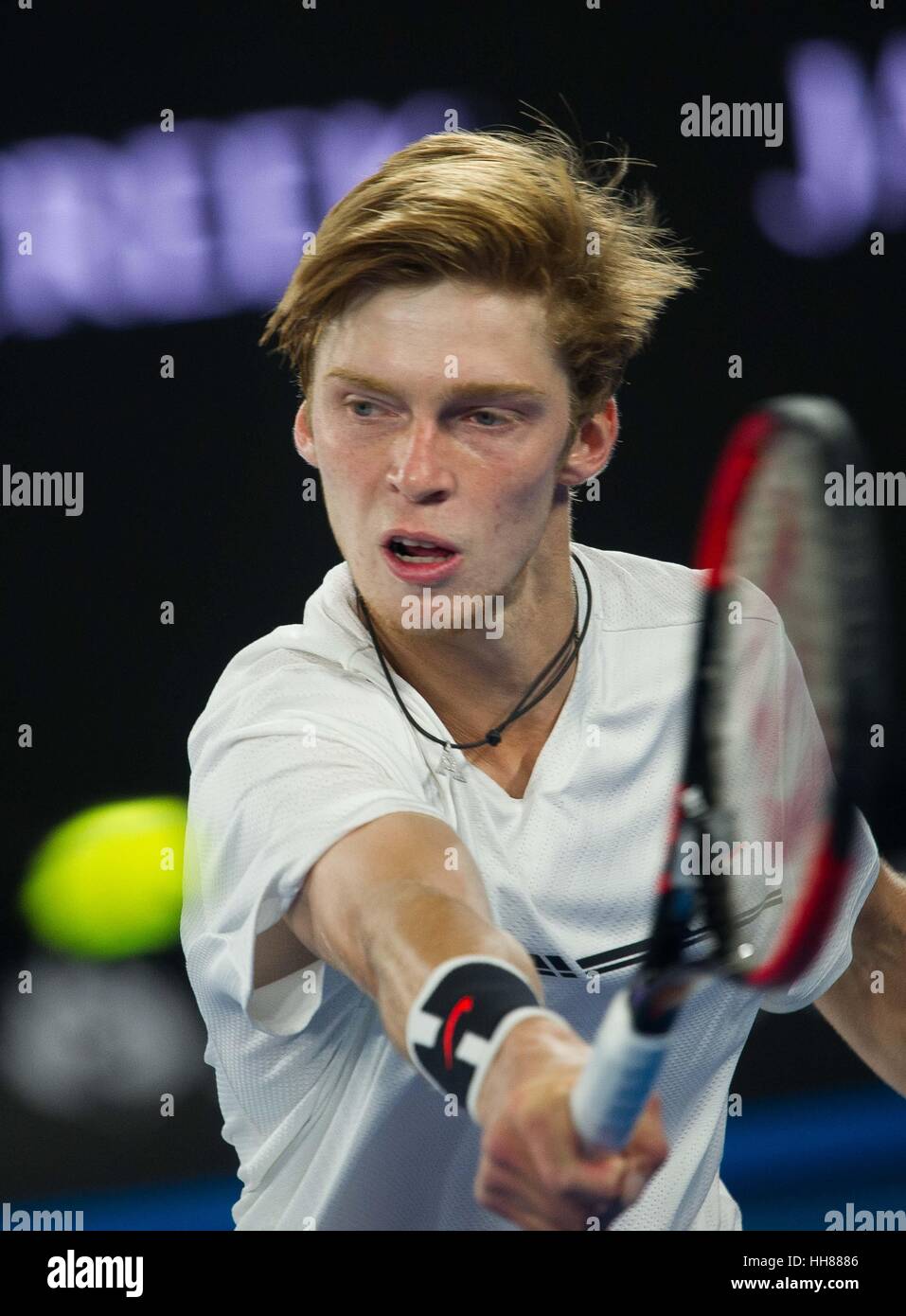 Melbourne, Australia. 18th Jan, 2017. Andrey Rublev of Russia returns ...