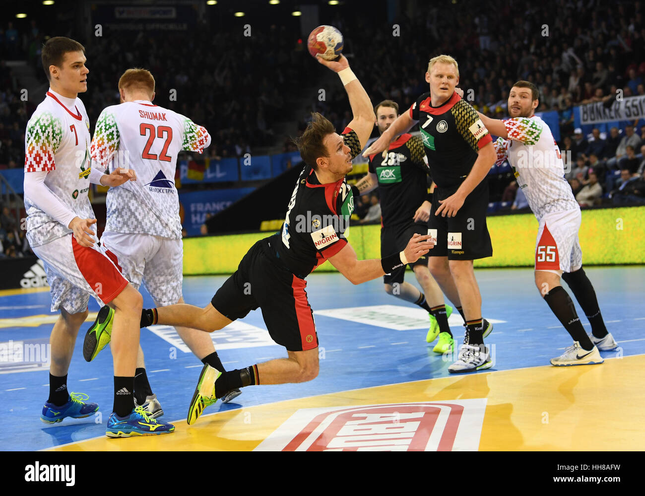 Rouen, France. 18th Jan, 2017. Germany's Kai Haefner (C) in action ...