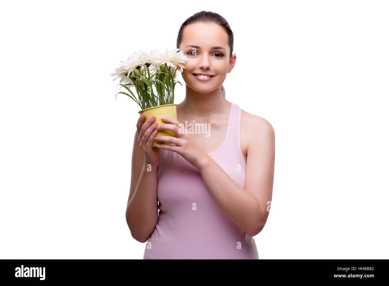 Young woman with flower pot isolated on white Stock Photo - Alamy