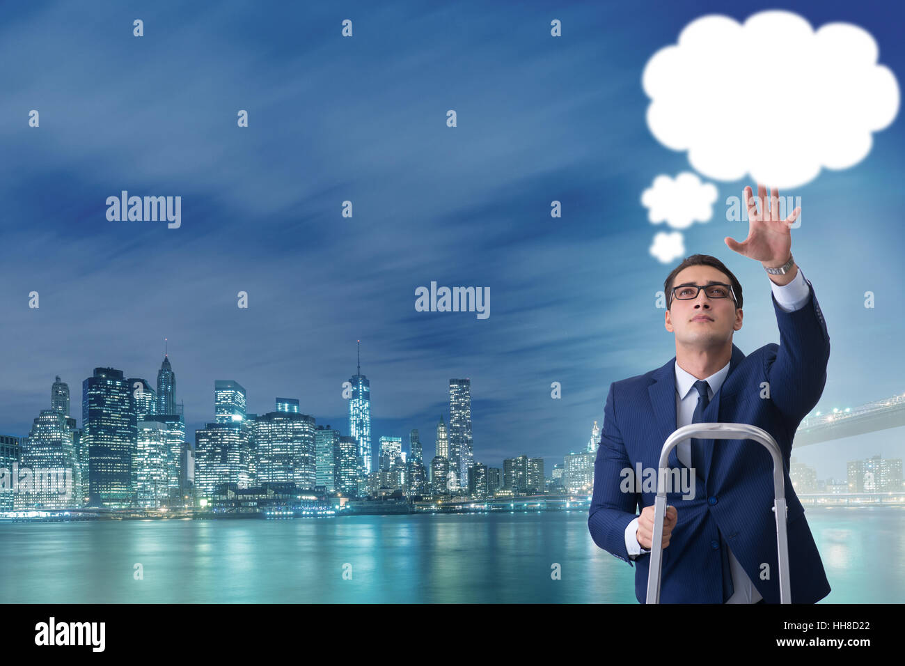 Businessman reaching out to callout message Stock Photo - Alamy
