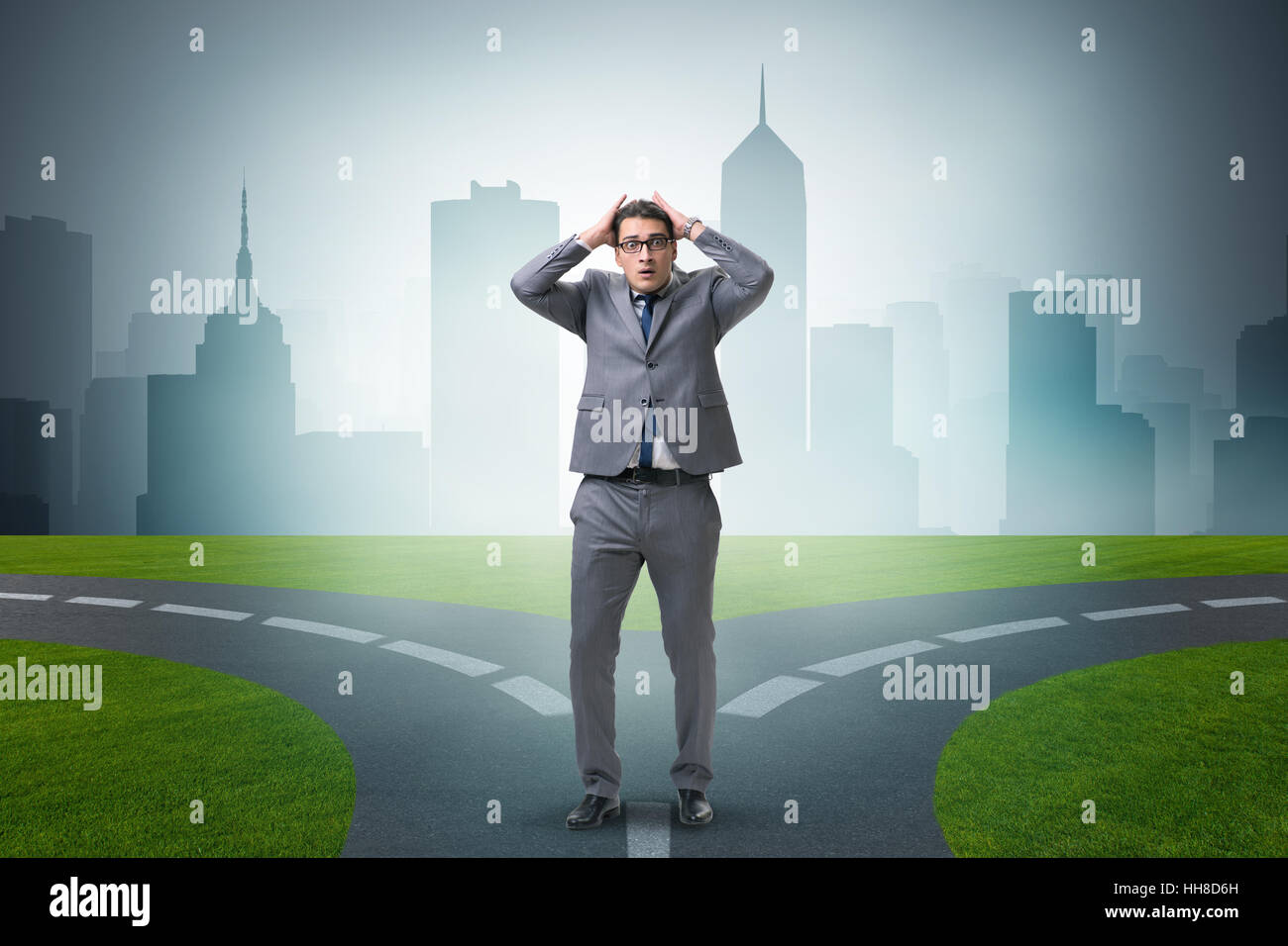 Businessman in difficult choice concept Stock Photo - Alamy