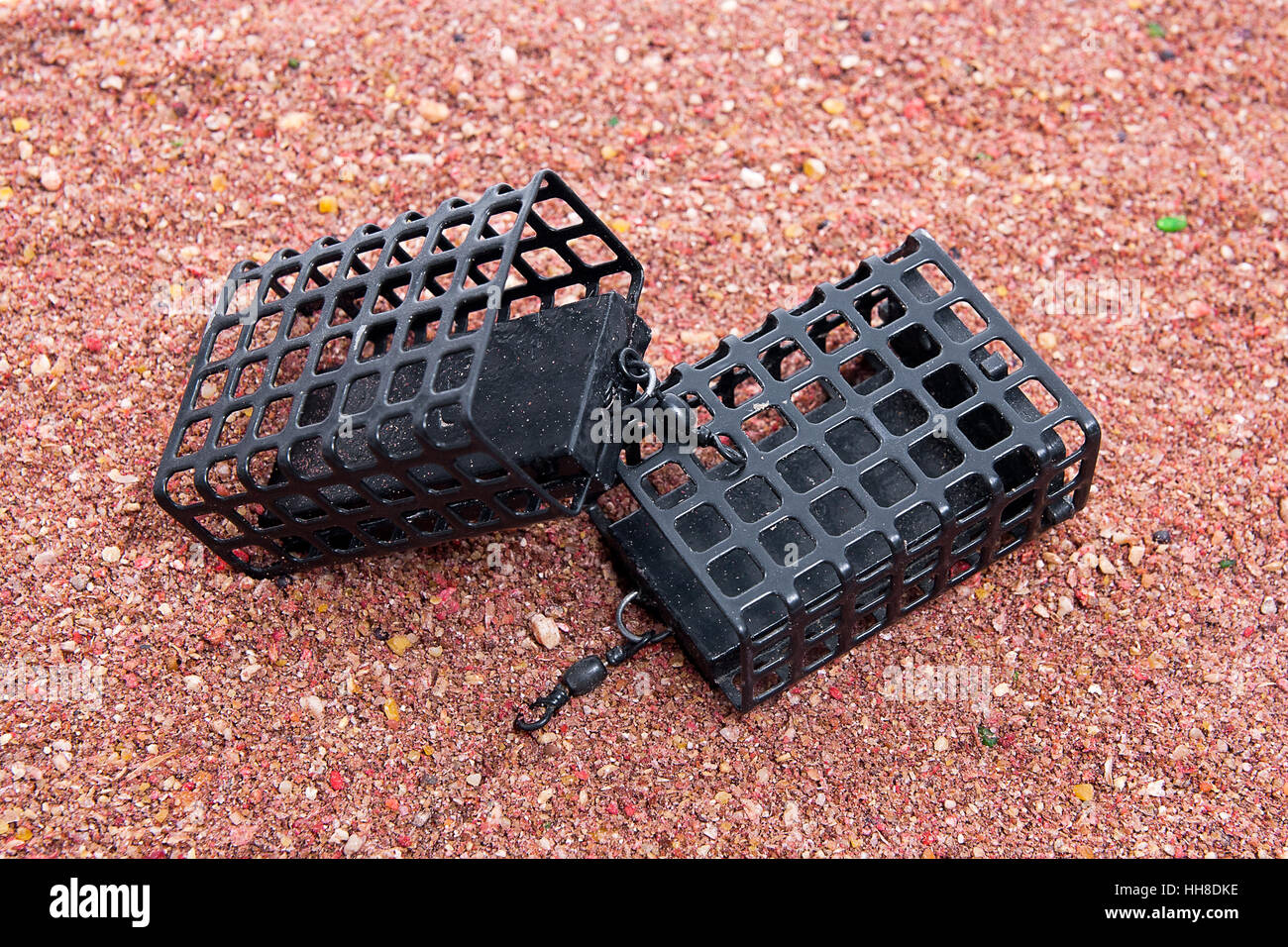 Close up view of fishing feeder. Dry feed for carp fishing as ...