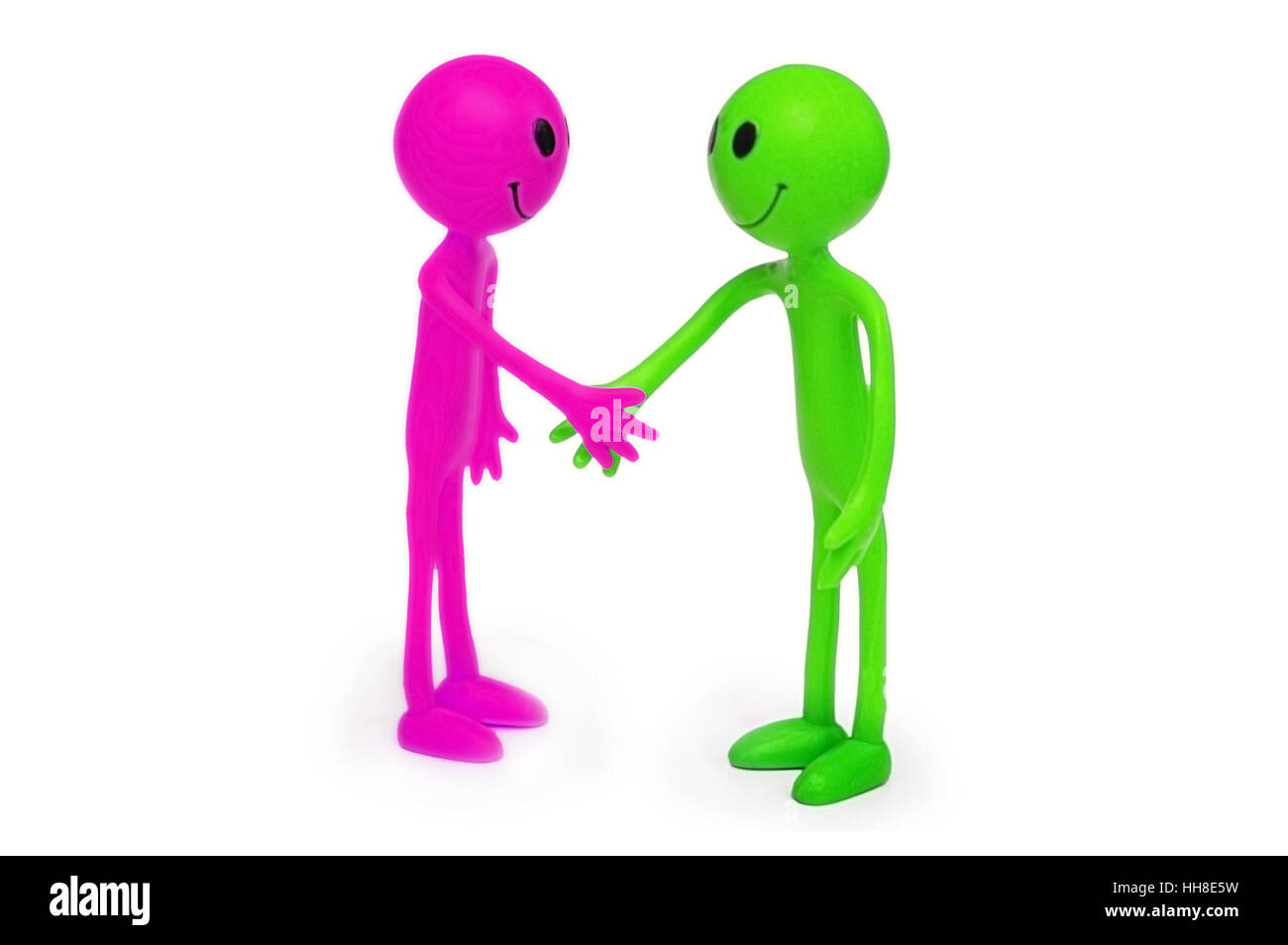 Two smilies shaking hands isolated on white Stock Photo - Alamy