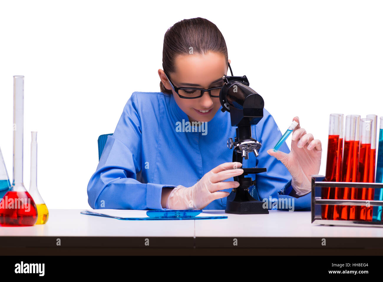 Young female doctor in lab isolated on white Stock Photo - Alamy