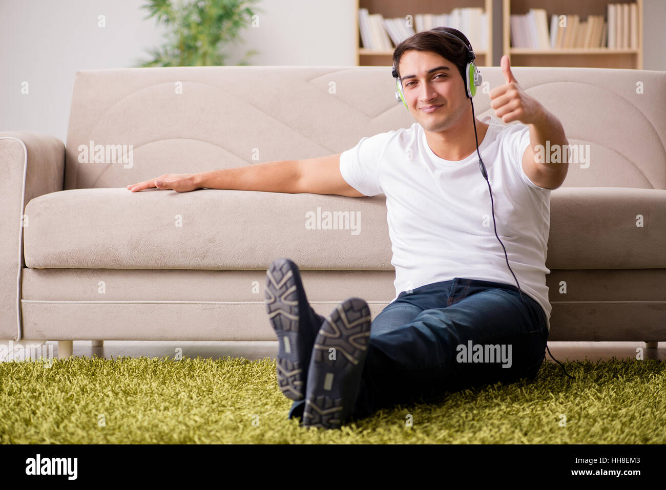 Handsome man listening to the music Stock Photo - Alamy