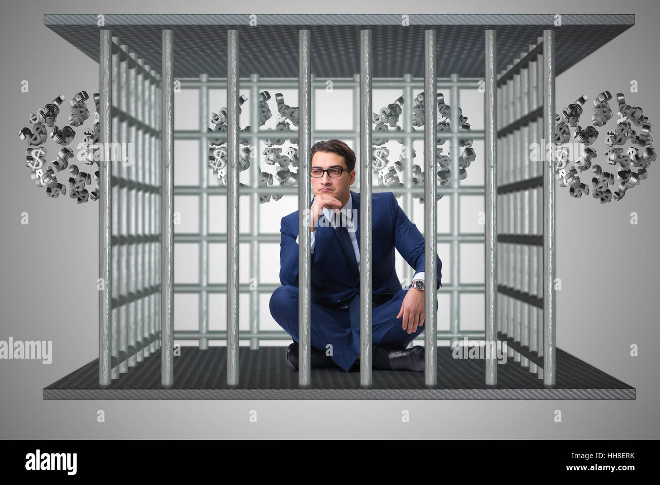 Man trapped in prison with dollars Stock Photo - Alamy