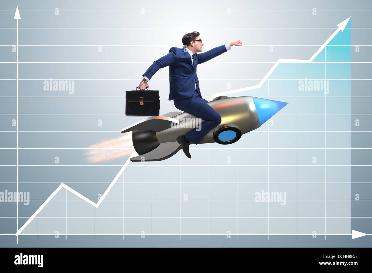 Businessman flying on rocket in business concept Stock Photo - Alamy