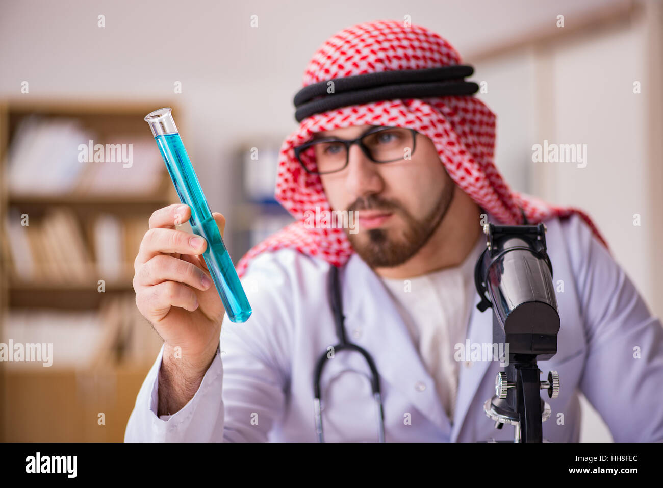 Arab doctor working in the lab hospital Stock Photo - Alamy
